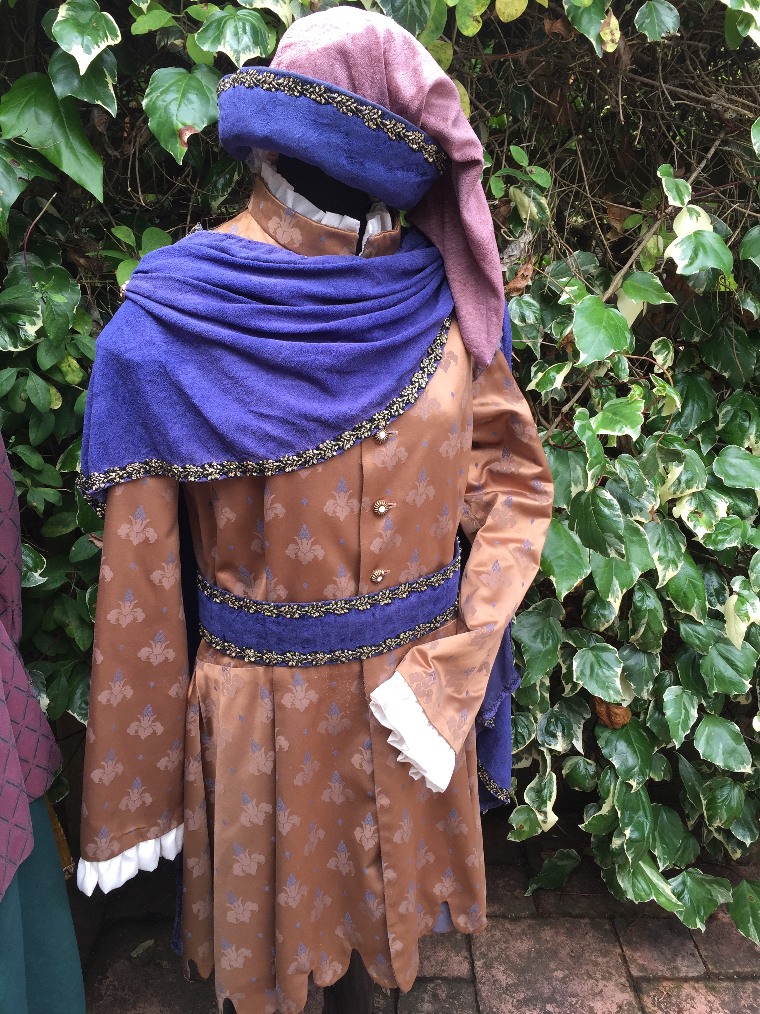 Mens Buff & Blue medieval prince Costume For Hire. Medieval Banquets