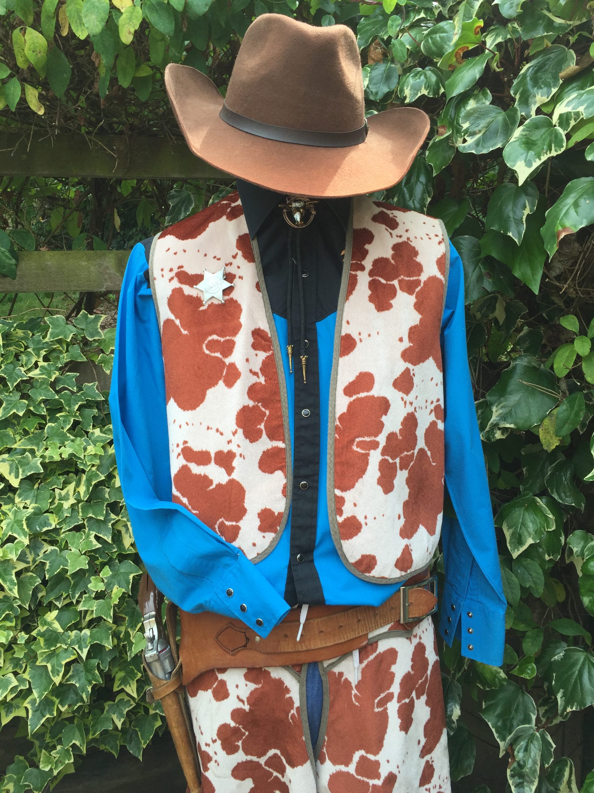 Masquerade Mens Cow Print Cowboy Costume For Hire. Western Fancy Dress
