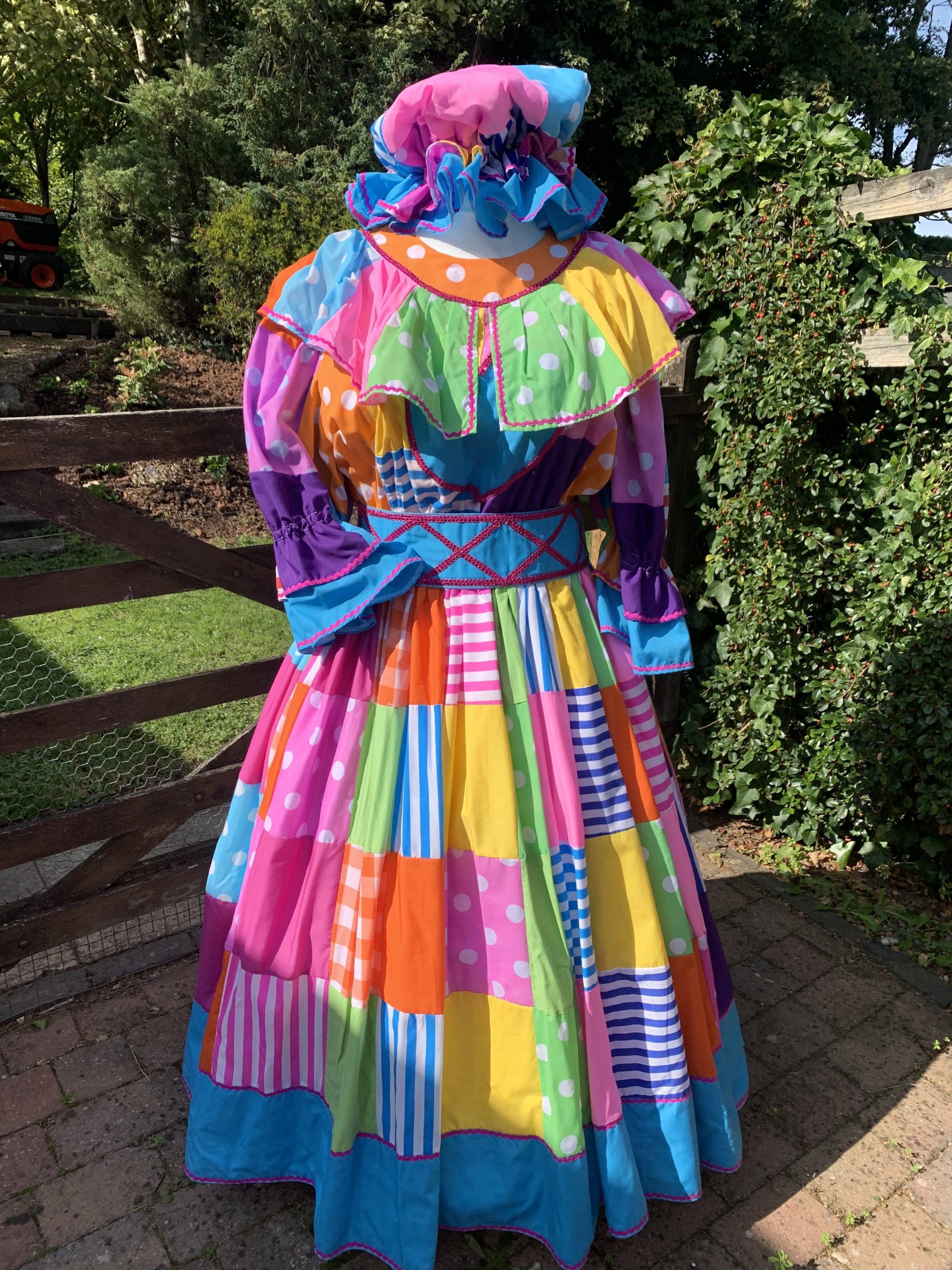 Masquerade Patchwork Pantomime Dame Costume For Hire. Pantomime Costumes